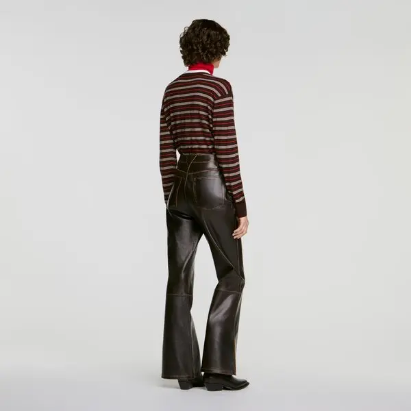 Sandro Distressed Leather Flared Trousers With Hem Slits