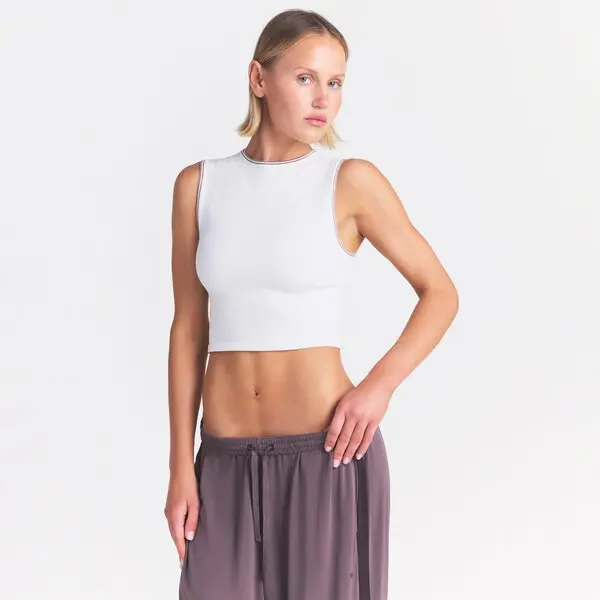 SKIMS Muscle Tank Top | White | | Nike Ribbed Seamless