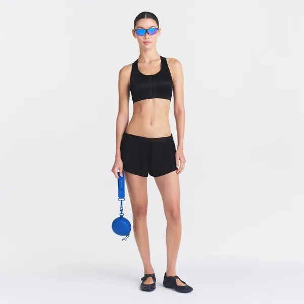 SKIMS Racerback Zip Front Bra | Black | | Nike Satin Shine