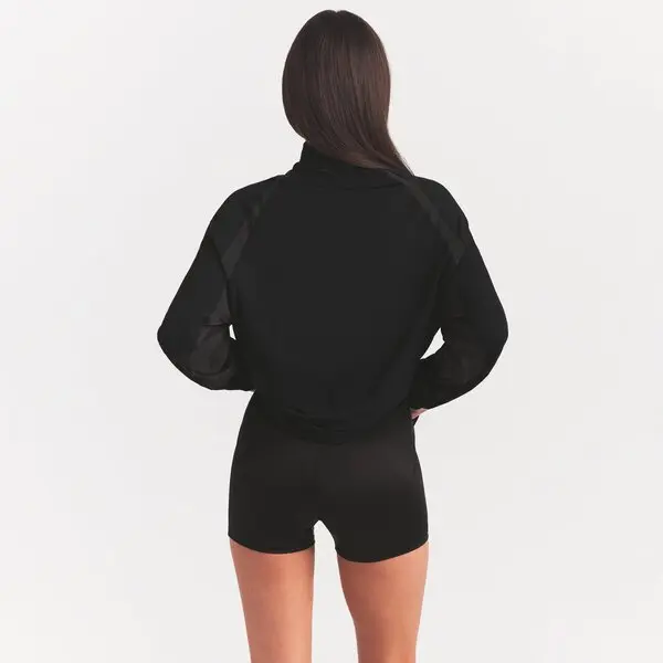 SKIMS Long Sleeve Half Zip | Black | | Nike Stretch Knit