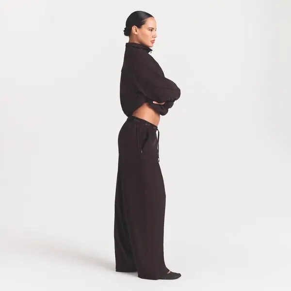 SKIMS Oversized Stretch Nylon Pants - Dark Roast