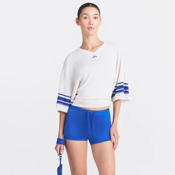 SKIMS Oversized V Neck Top | Blue | | Nike Stretch Knit