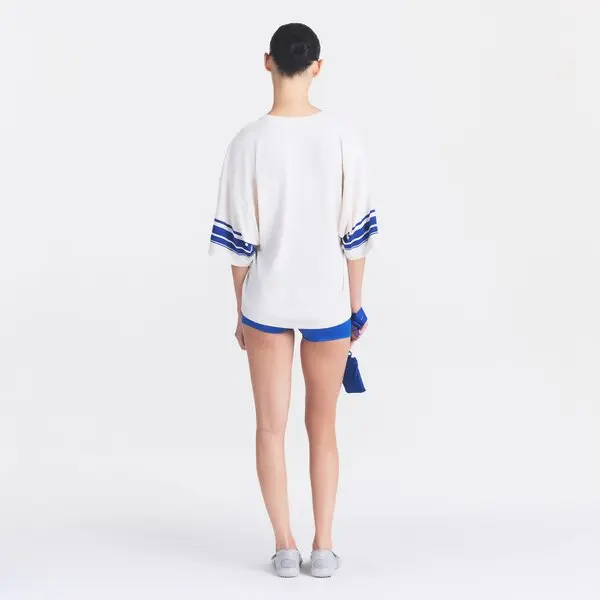 SKIMS Oversized V Neck Top | Blue | | Nike Stretch Knit