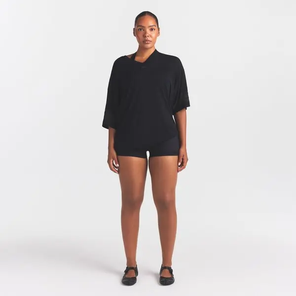 SKIMS Oversized V Neck Top | Black | | Nike Stretch Knit