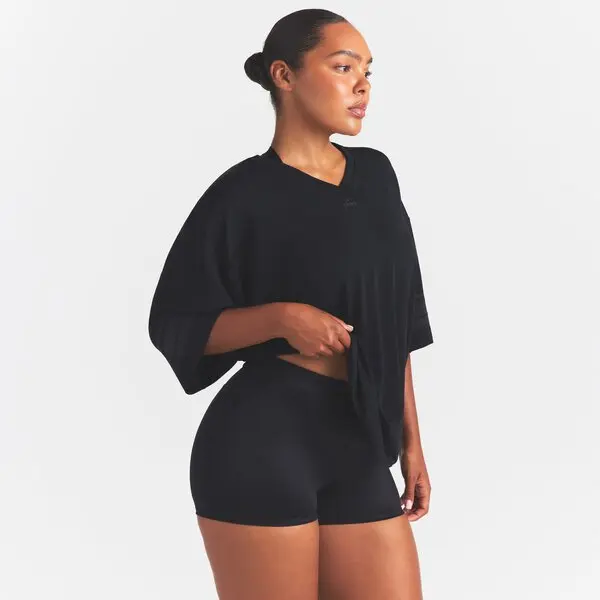 SKIMS Oversized V Neck Top | Black | | Nike Stretch Knit