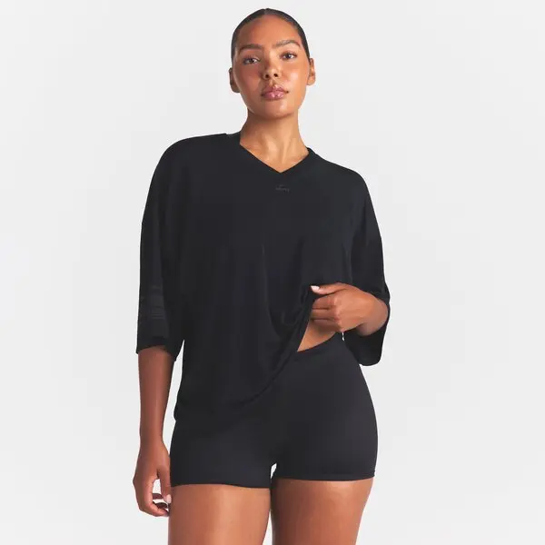 SKIMS Oversized V Neck Top | Black | | Nike Stretch Knit