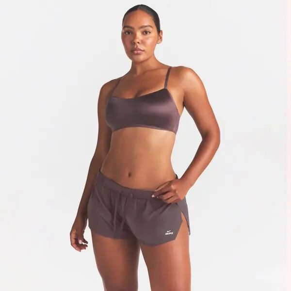 SKIMS Runner Short | Medium Neutral | | Nike Stretch Nylon