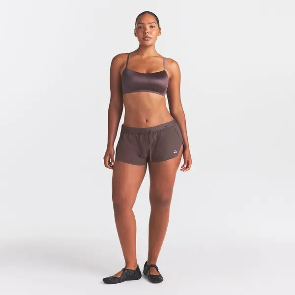SKIMS Runner Short | Medium Neutral | | Nike Stretch Nylon