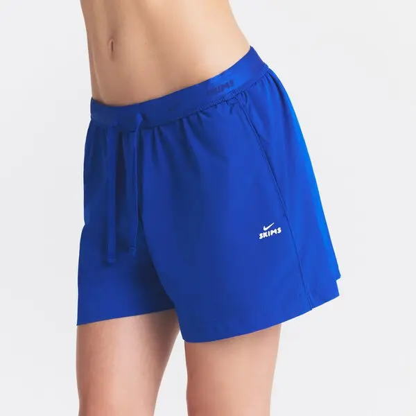 SKIMS 5" Track Short | Blue | | Nike Stretch Nylon