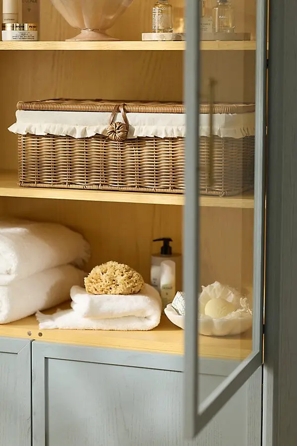 Anthropologie Calista Skirted Faux Rattan Trunk