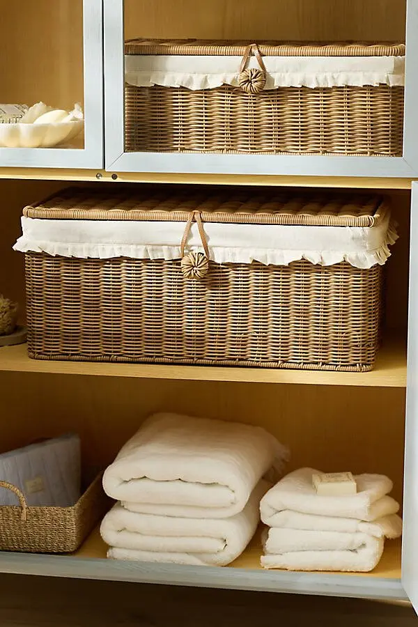 Anthropologie Calista Skirted Faux Rattan Trunk