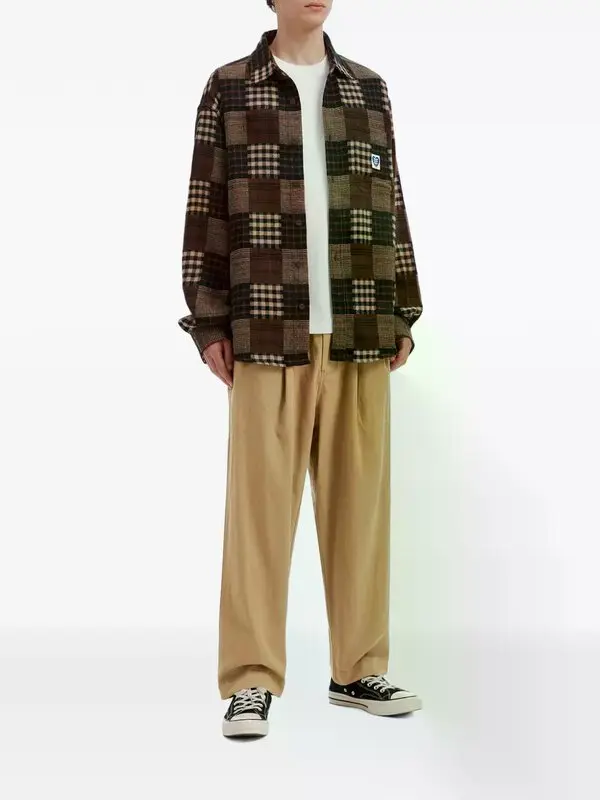 FINGERCROXX Logo-patch Pleat-detail Trousers