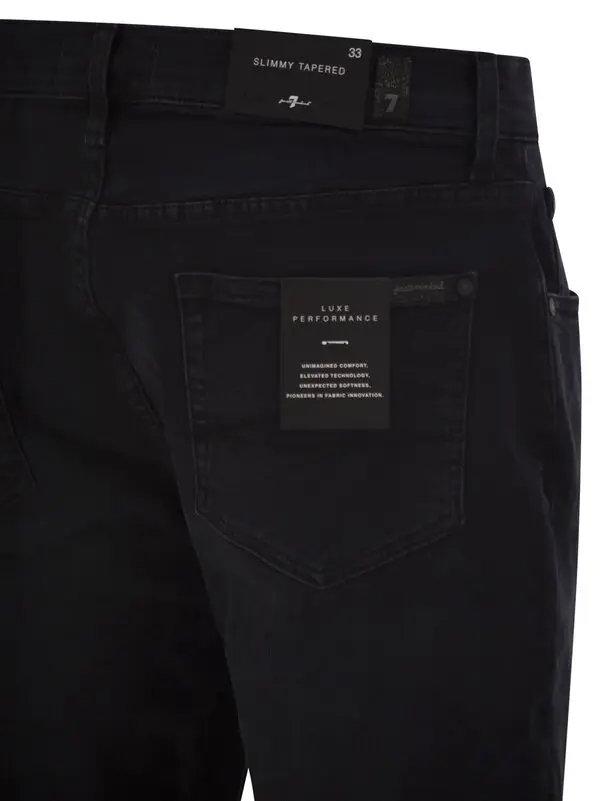 7 For All Mankind Slimmy Tapered Low Jeans In Denim