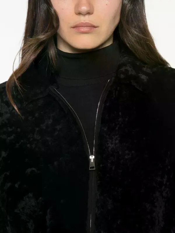 Simonette Ravizza Strappy Buckle-detail Fur Jacket