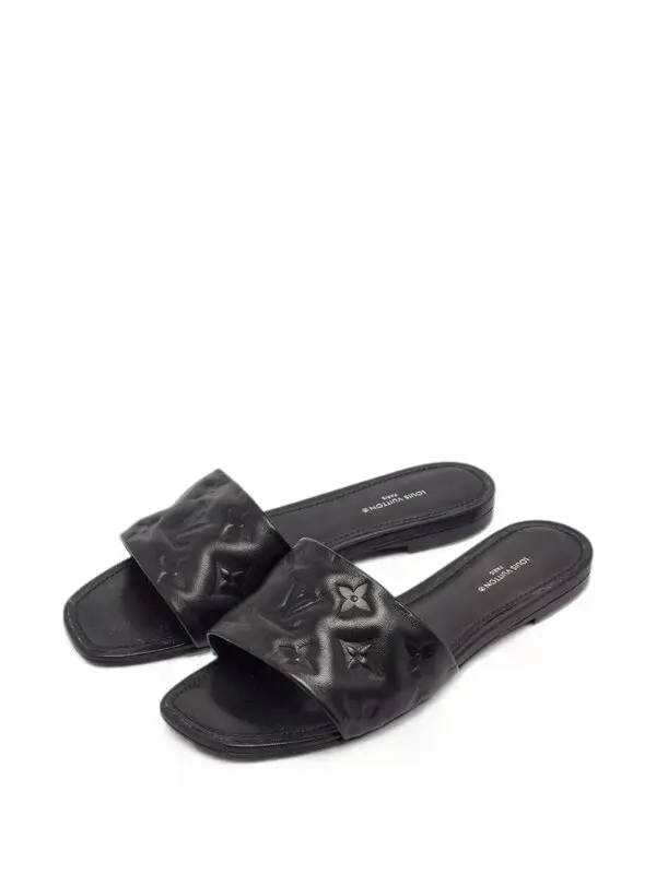 LOUIS VUITTON Revival Monogram Debossed Sandals
