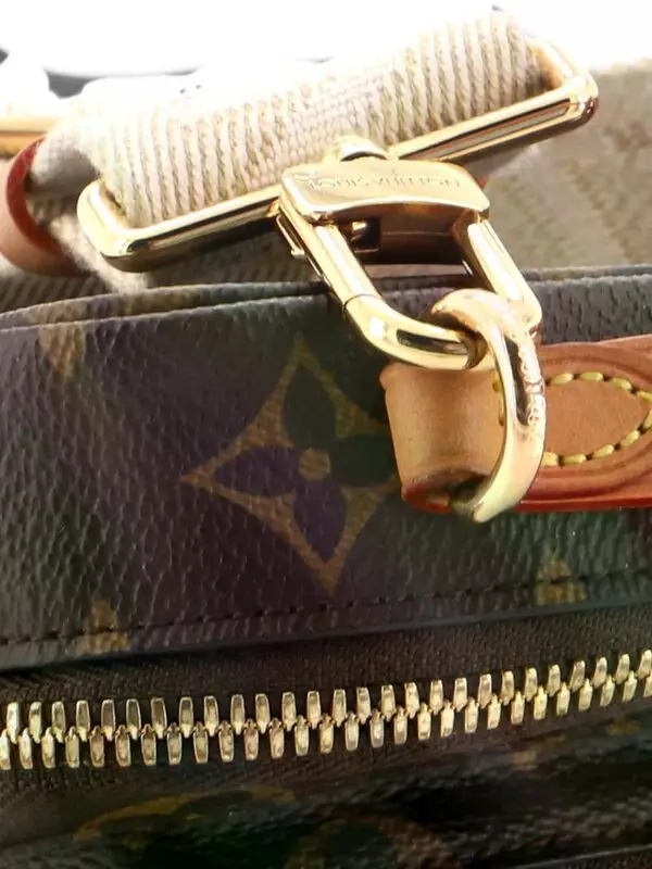 LOUIS VUITTON Utility Monogram Canvas Crossbody Bag