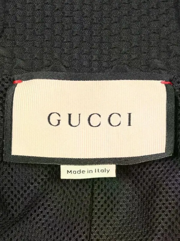 Gucci Gg Embossed High Neck Zip-up Jacket