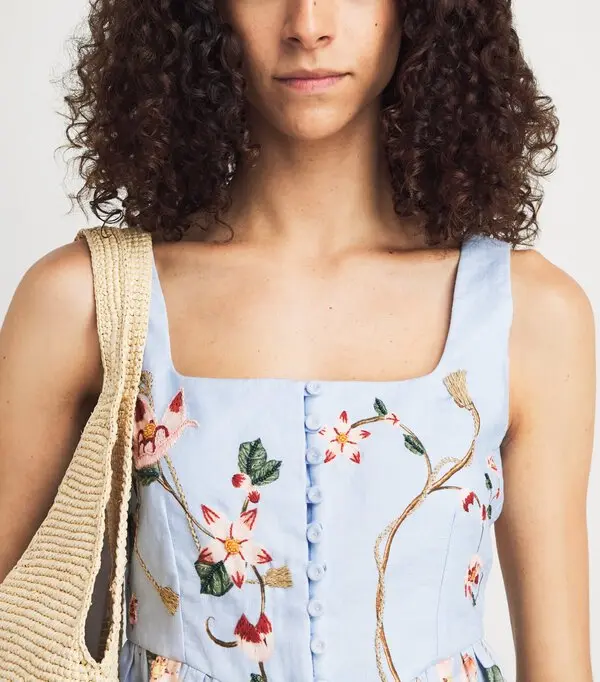 Agua Bendita Linen Floral Embroidered Peplum Corset Top