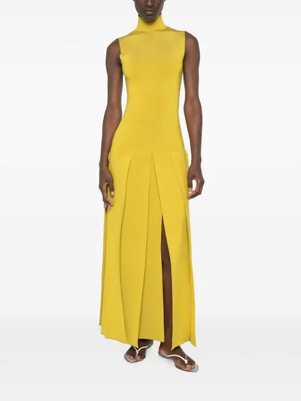 Alaïa High Neck Sleeveless Maxi Dress With Pleated Skirt And Side Slit
