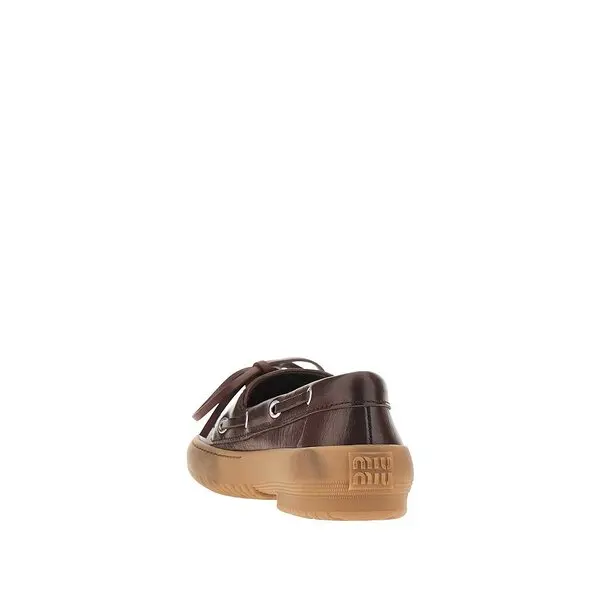Miu Miu Leather Boat Shoes With Embossed Logo