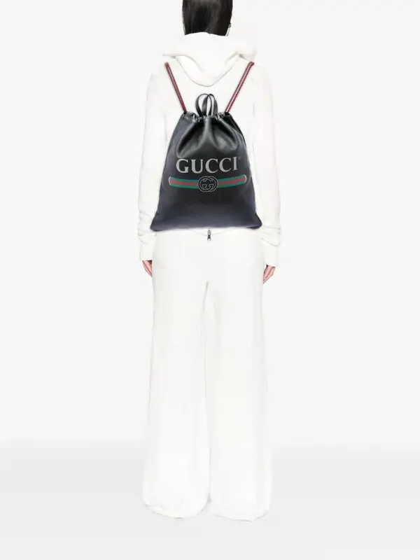 Gucci 2021-2026 Grained Calfskin Web Logo Drawstring Backpack