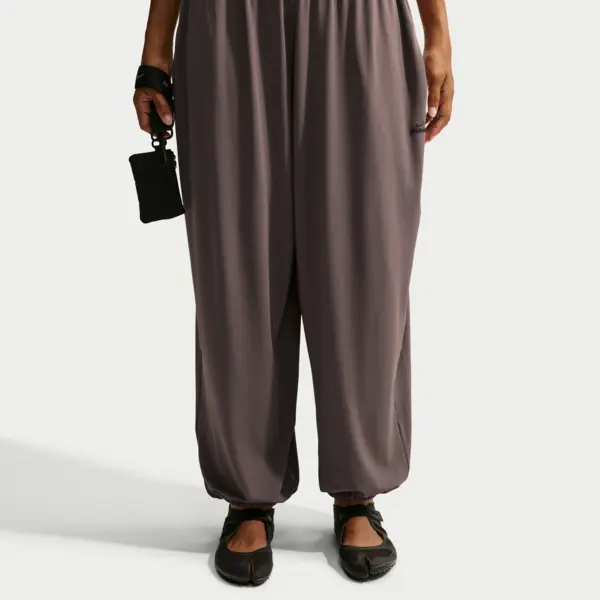 Nike Stretch Knit Flowy Pants With Cuffed Ankles