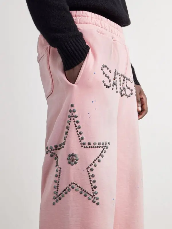 SATOSHI NAKAMOTO Wide-leg Studded Cotton-jersey Sweatpants - Pink
