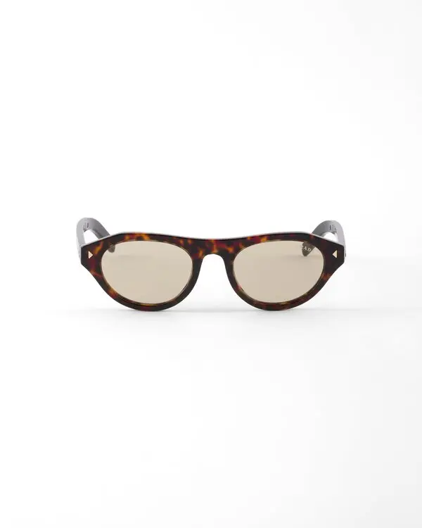 Prada Sunglasses With The Iconic Metal Plaque
