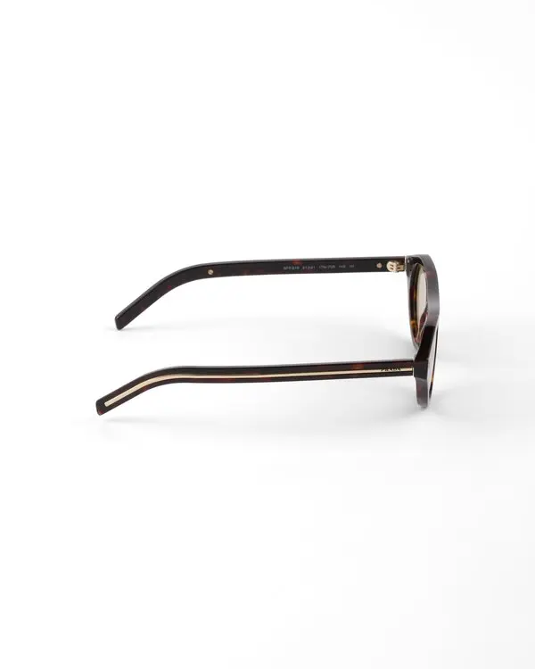 Prada Sunglasses With The Iconic Metal Plaque