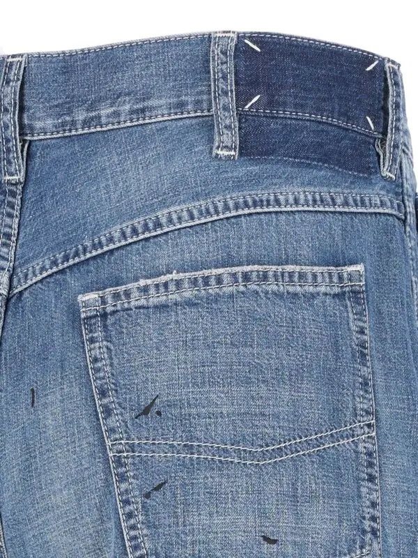 MAISON MARGIELA Treated Denim Jeans