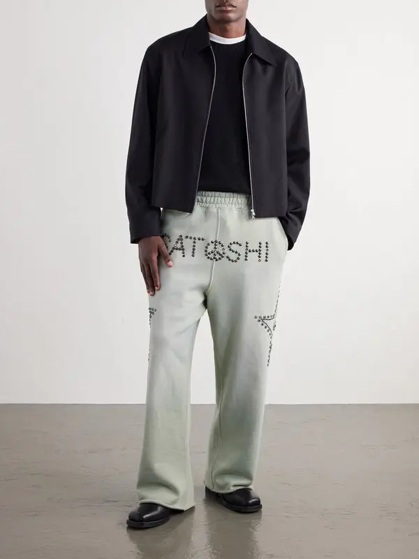 SATOSHI NAKAMOTO Wide-leg Studded Cotton-jersey Sweatpants - Green