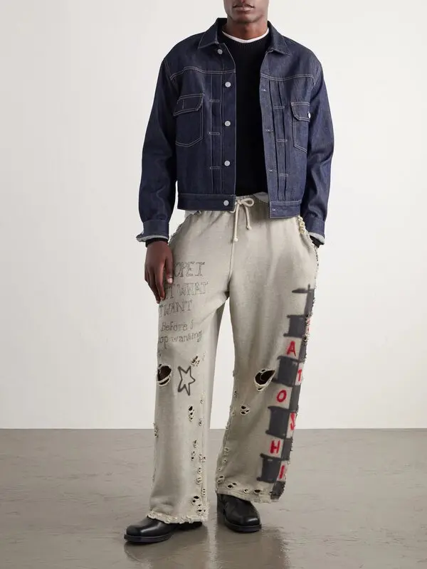 SATOSHI NAKAMOTO Get What I Want Printed Embellished Distressed Cotton-jersey Sweatpants