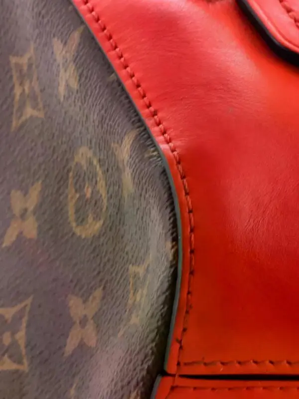 LOUIS VUITTON Monogram Canvas Saintonge Handbag With Leather Crossbody Strap - Red