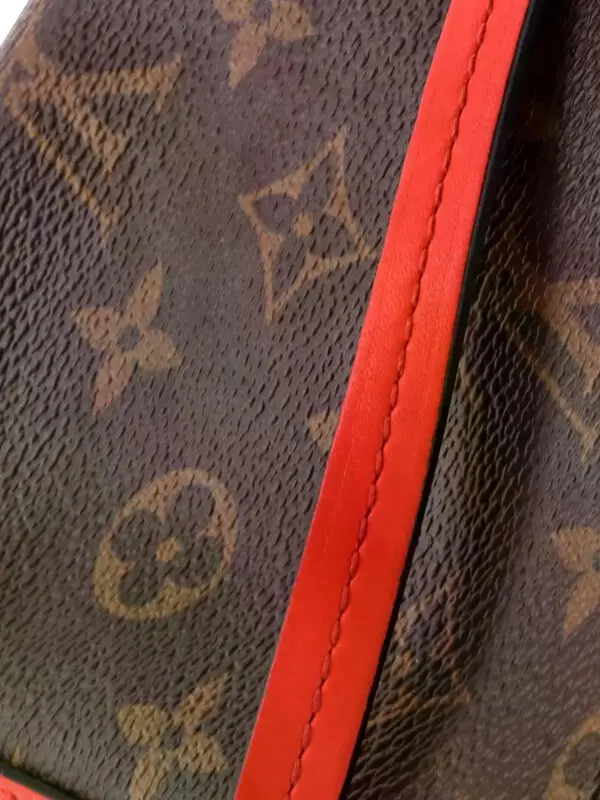 LOUIS VUITTON Monogram Canvas Saintonge Handbag With Leather Crossbody Strap - Red