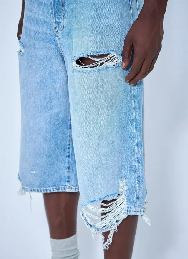 Acne Studios Distressed Denim Culottes With Raw Hems - Blue