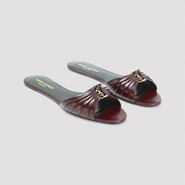 Saint Laurent Babylone" Glossed Leather Flat Sandals With Cassandre Logo