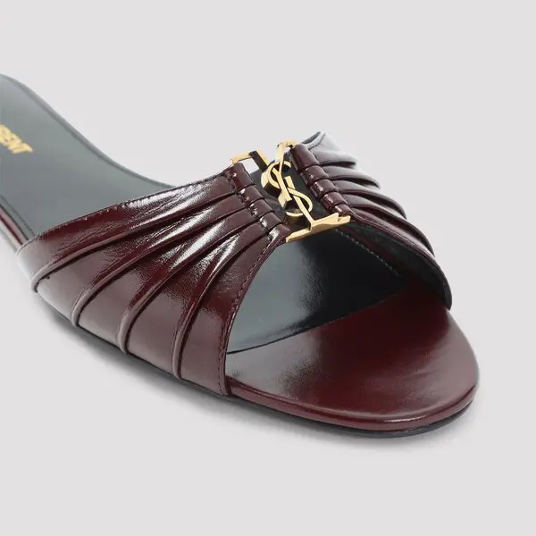 Saint Laurent Babylone" Glossed Leather Flat Sandals With Cassandre Logo