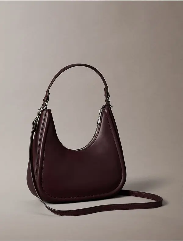 Calvin Klein Embossed Monogram Crescent Bag - Fudge