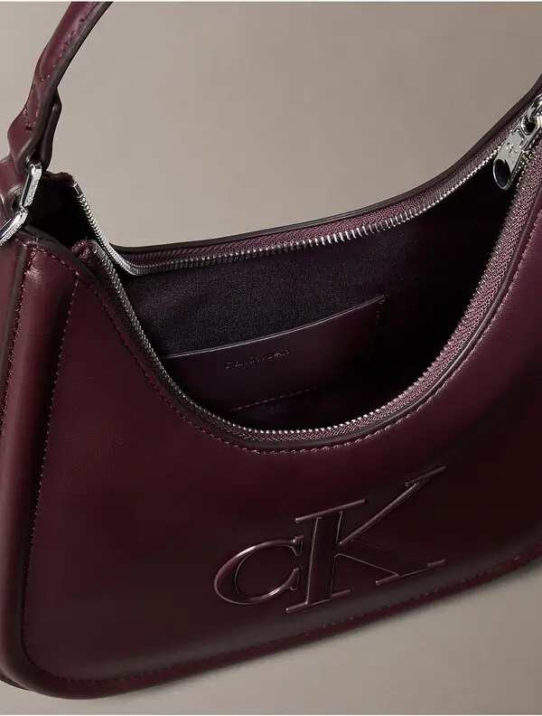 Calvin Klein Embossed Monogram Crescent Bag - Fudge