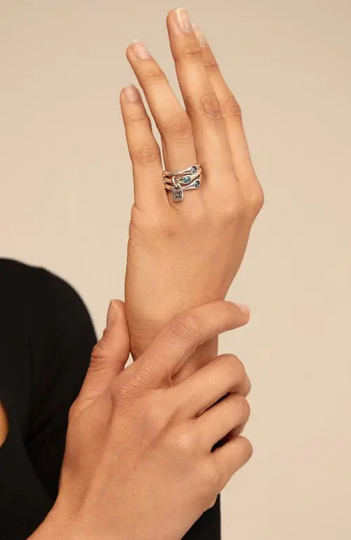 UNODE50 Sterling -plated Triple Ring With Red Crystals