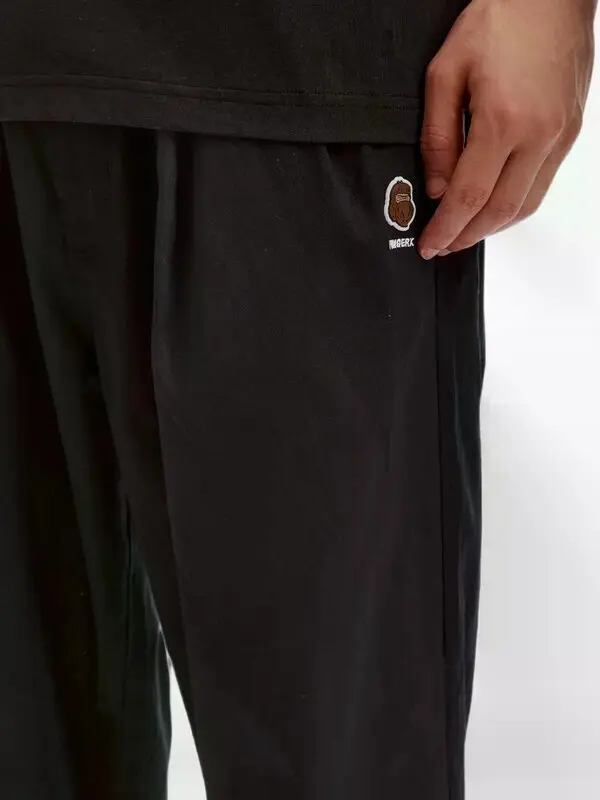 FINGERCROXX Logo-patch Pleated Trousers