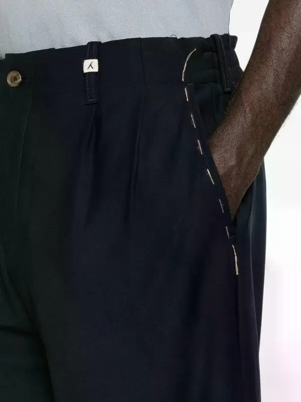 MYTHS Pleated-front Wide-leg Trousers