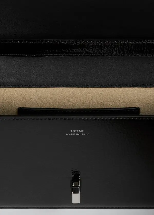 TOTEME T-lock Grained-patent Crossbody
