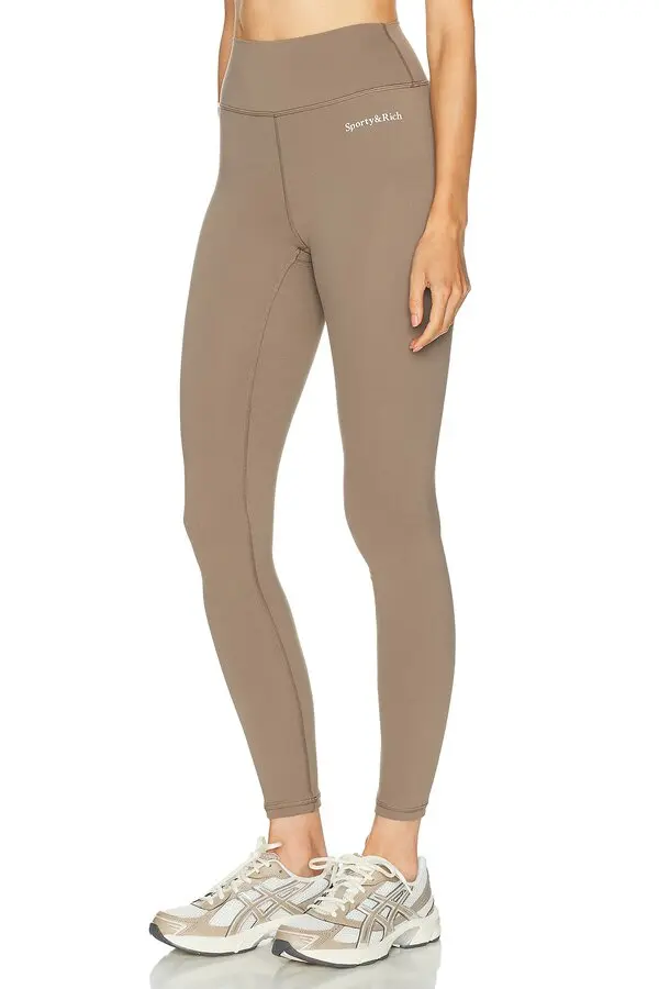 SPORTY & RICH Serif Logo Legging In Tan