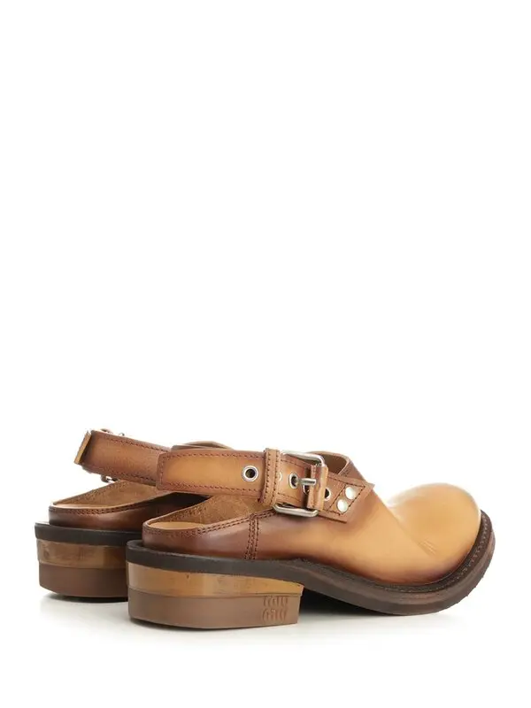 Miu Miu Aged Leather Mules With Buckle Detail