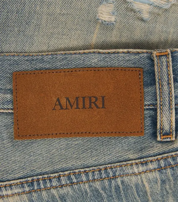 Amiri Ripped Repair Mx1 Straight Jeans