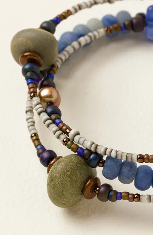 UNCOMMON GOODS Tumbled Blue Ocean Spiral Bracelet