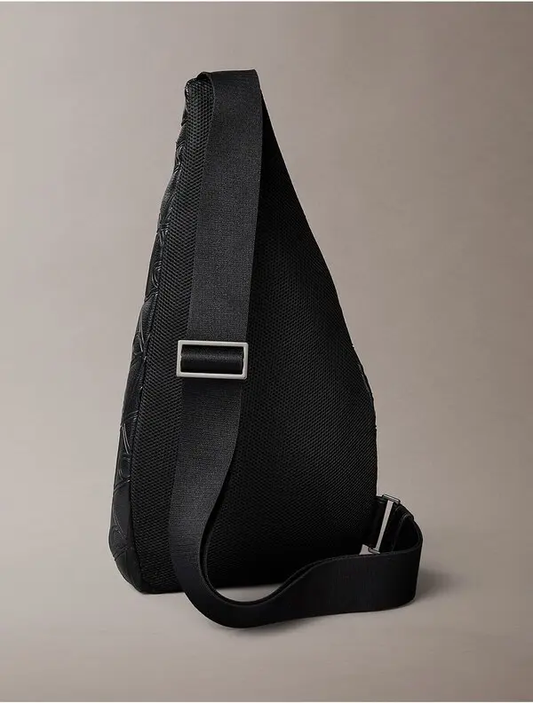 Calvin Klein Debossed Allover Emblem Logo Sling Bag