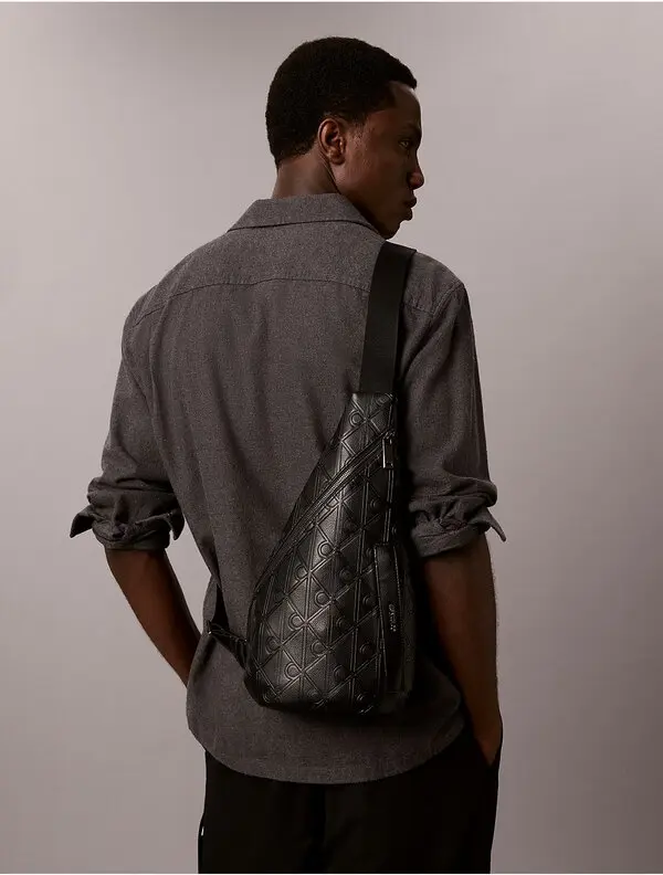 Calvin Klein Debossed Allover Emblem Logo Sling Bag