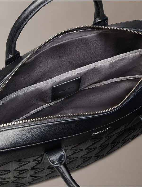 Calvin Klein Debossed Allover Emblem Logo Commuter Bag